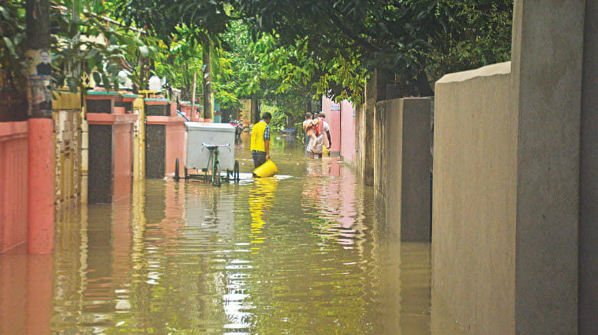 Downpour drowns port city | The Daily Star