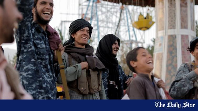 Taliban fighters enjoy rare day off at amusement park | The Daily Star