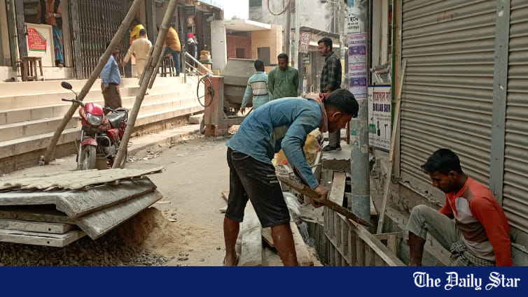 Slow construction work obstructs traffic movement | The Daily Star